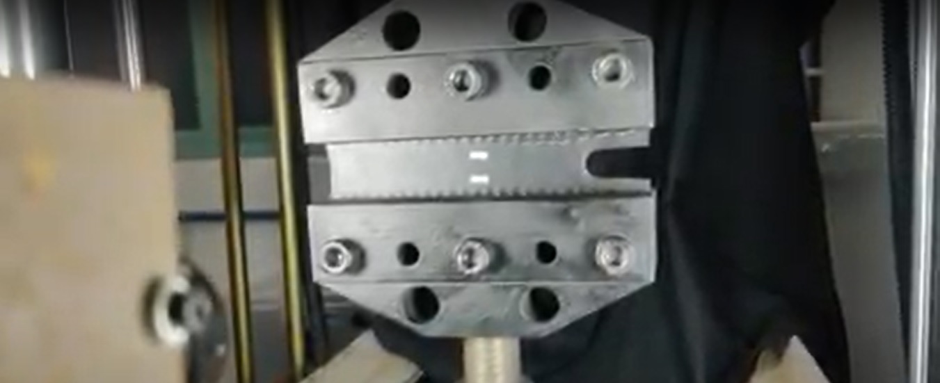 Evaluation of Critical Tearing Energy of Rubber Materials